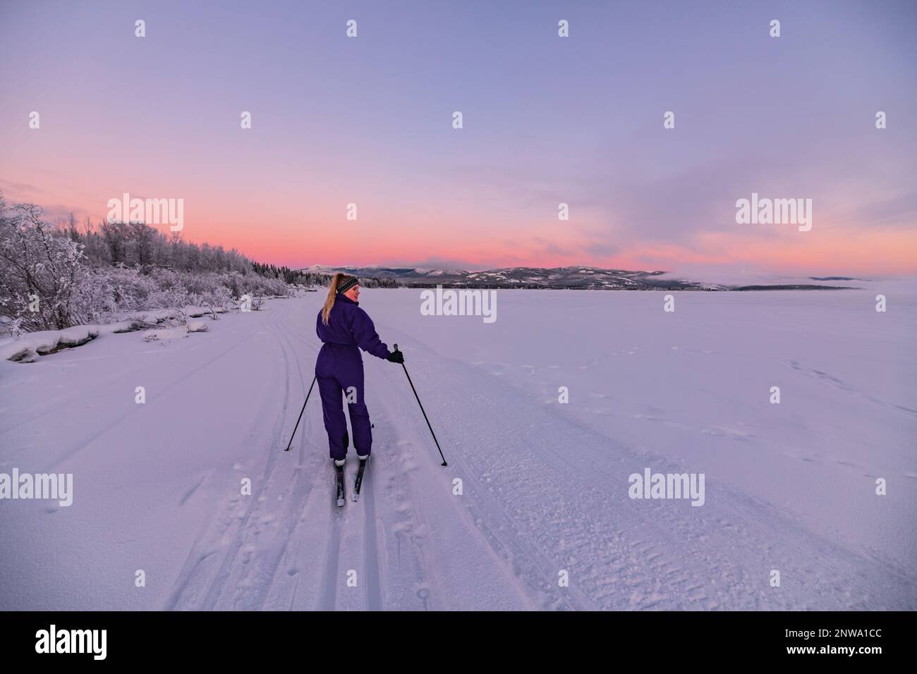 Amazing pastel sunset views along the Yukon River with one person ...