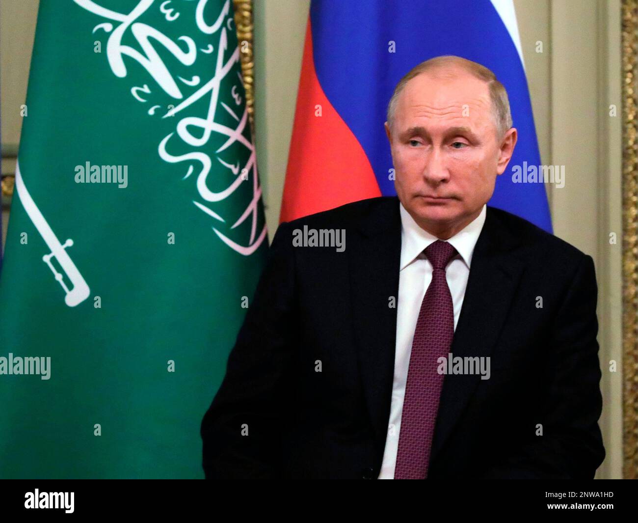 Russian President Vladimir Putin listens to Saudi Arabia's Crown Prince ...