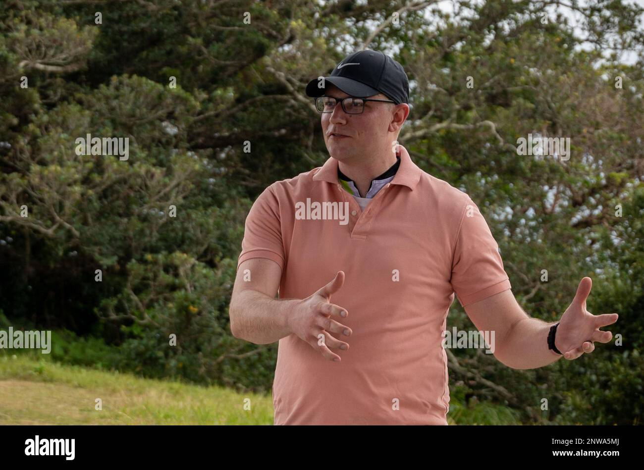 U.S. Navy Lt. Travis O’Reilly engages in a group discussion during a ...