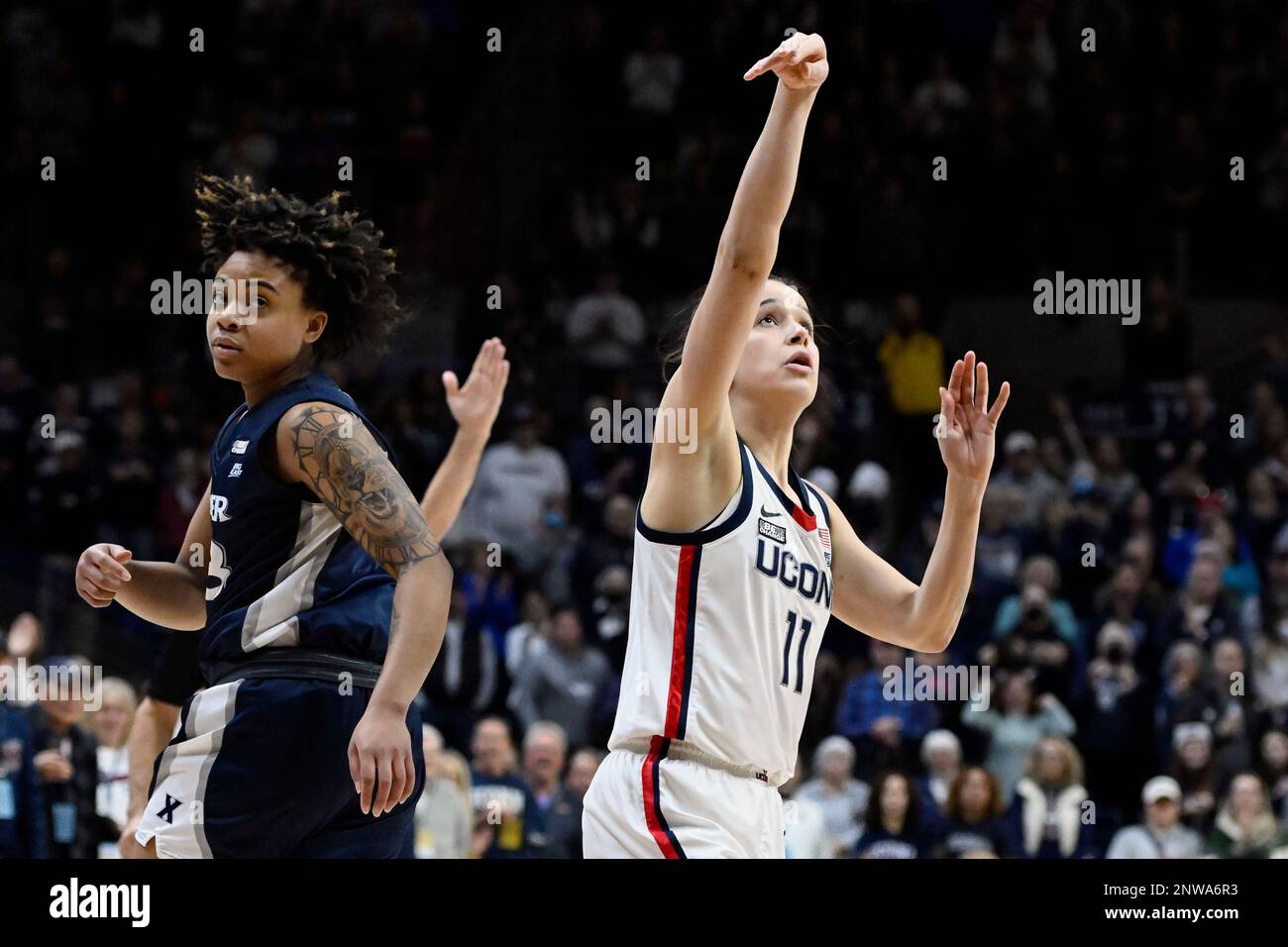 Uconns Lou Lopez Senechal Watches Her Shot With Xaviers Aanaya Harris