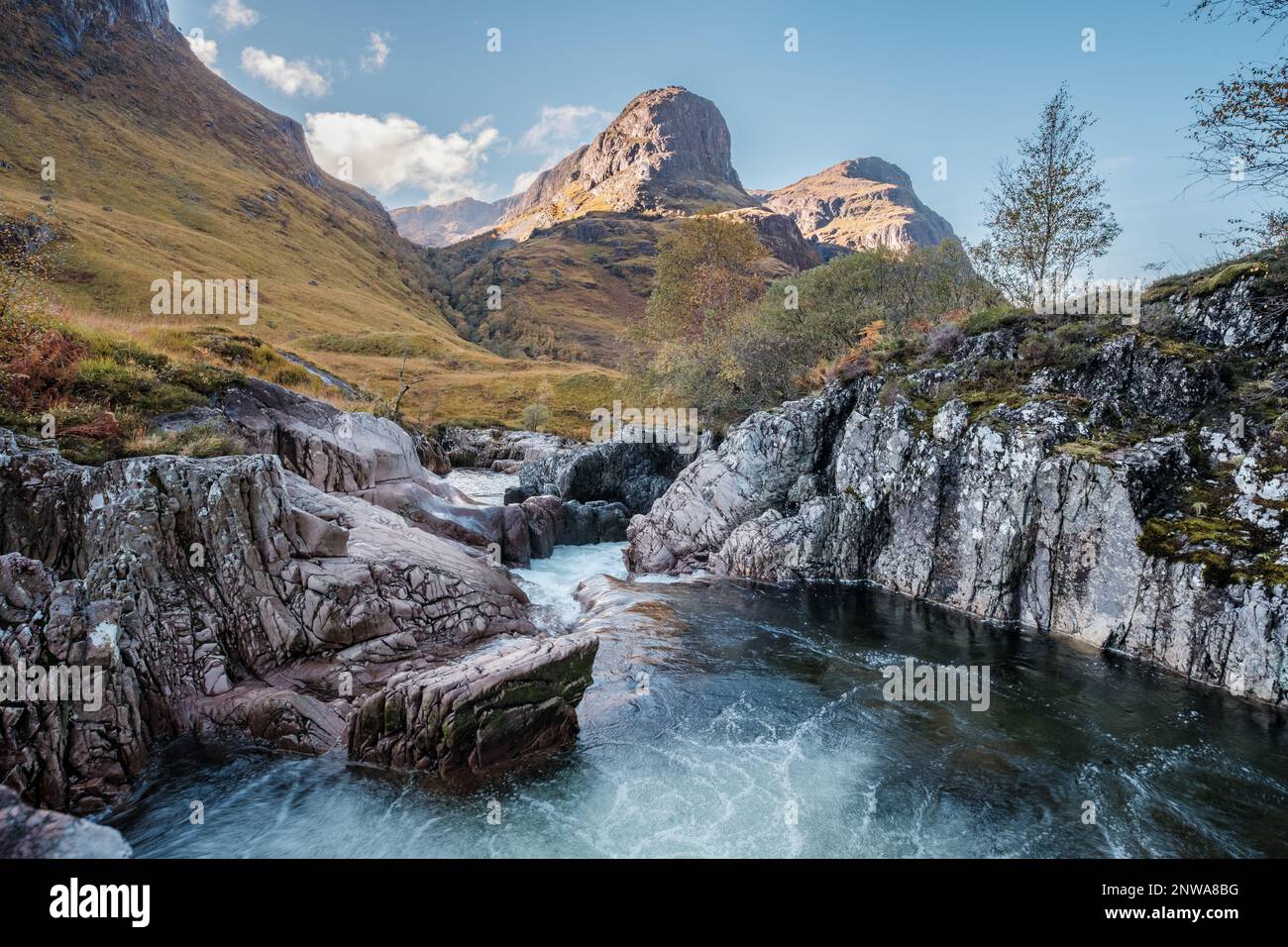 River Coe below Bidean nam Bian and the entrance to Coire Gabhail the ...