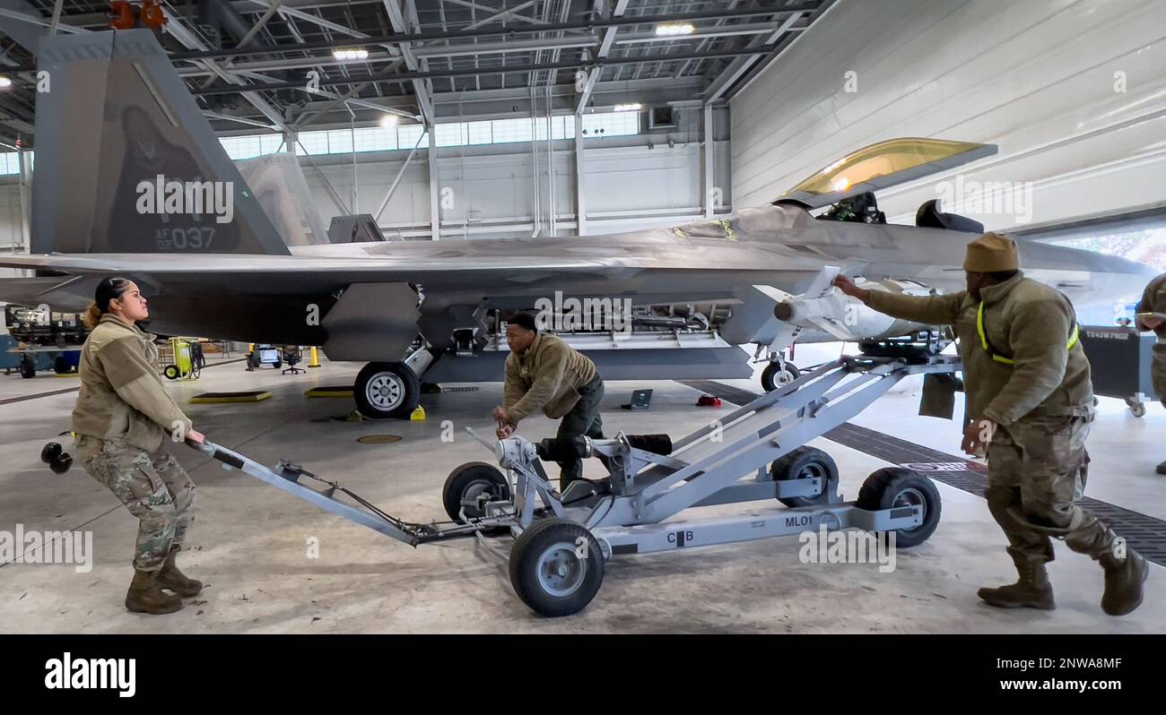 A 43rd Fighter Generation Squadron load crew move a GBU-32 toward their ...