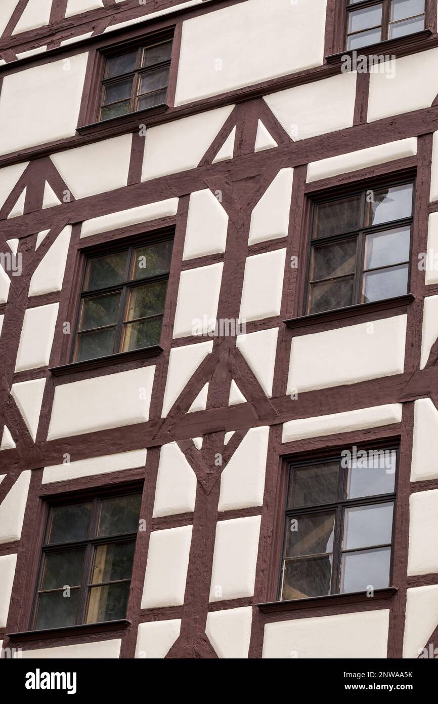 Detail of Half-timber works or Fachwerk in German on the facade of a ...