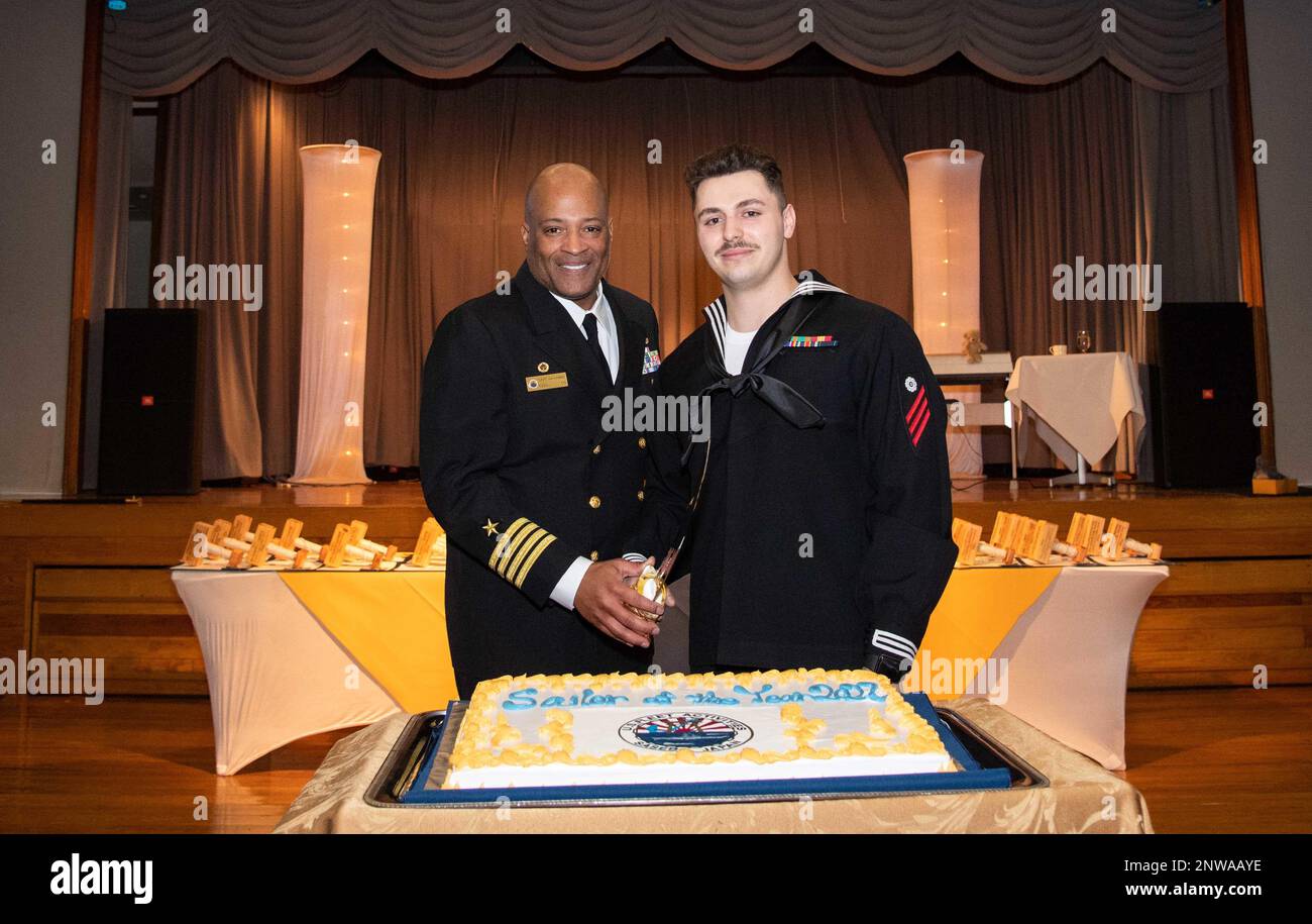 Capt. David Adams, Commander, Fleet Activities Sasebo (CFAS), poses for a photo with Engineman ...