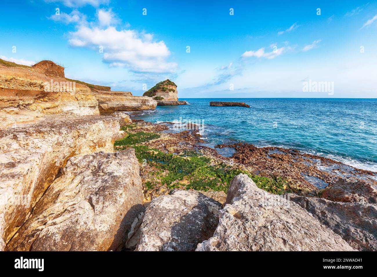 Picturesque seascape with white rocky cliffs, sea bay, islets and ...