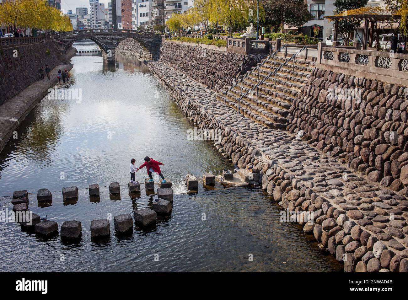 street scene, in background Spectacles Bridge, Nagasaki, Japan Stock ...