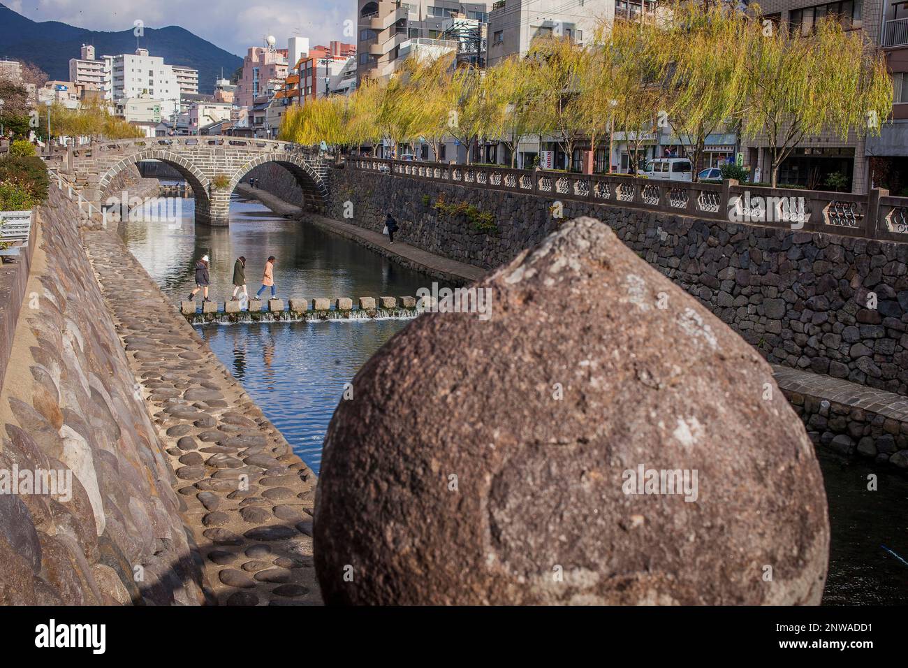 street scene, in background Spectacles Bridge, Nagasaki, Japan Stock ...