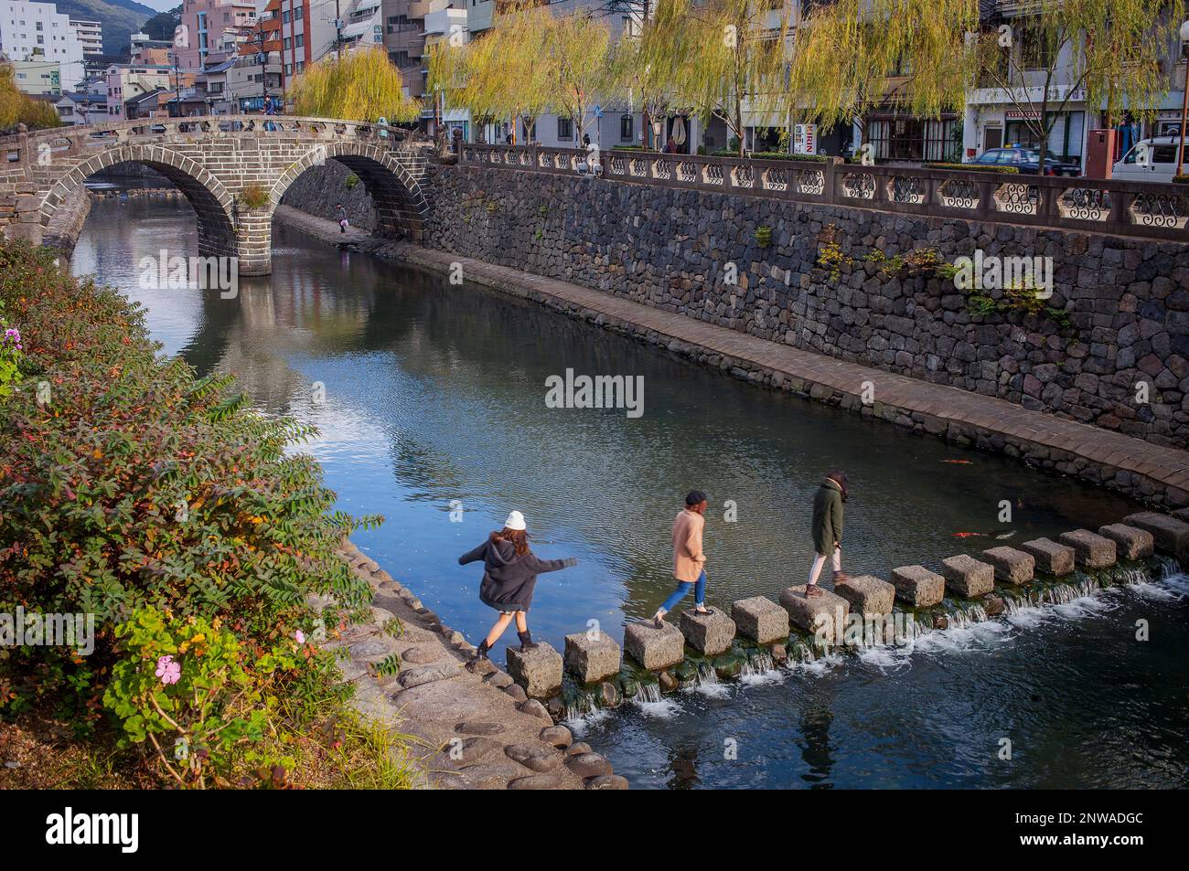 street scene, in background Spectacles Bridge, Nagasaki, Japan Stock ...