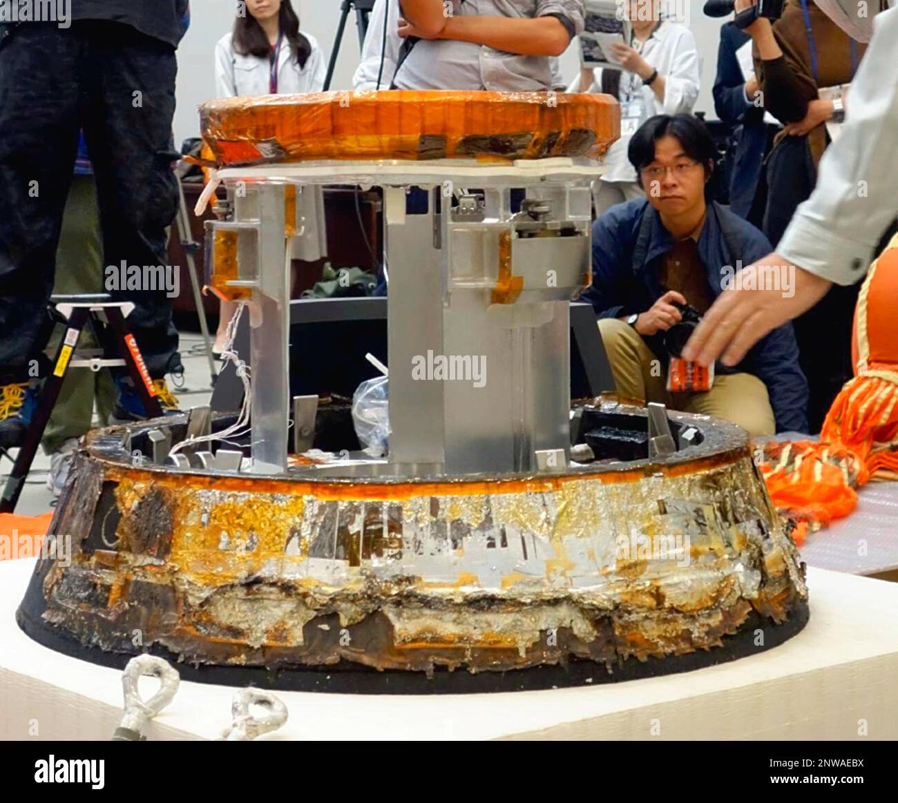 The Japan Aerospace Exploration Agency, or JAXA, unveils a compact ...