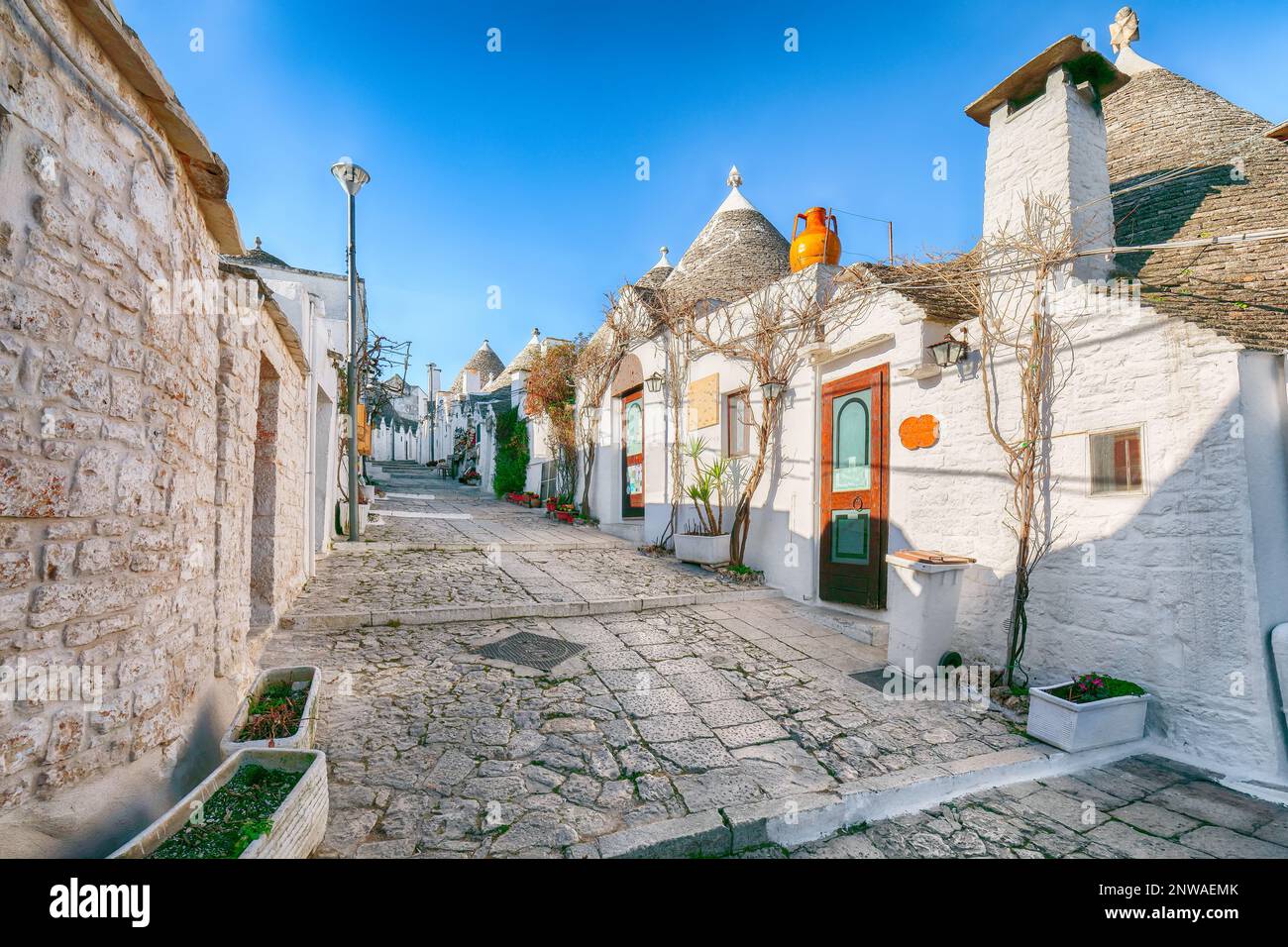Trulli of Alberobello typical houses street view. Town of Alberobello ...