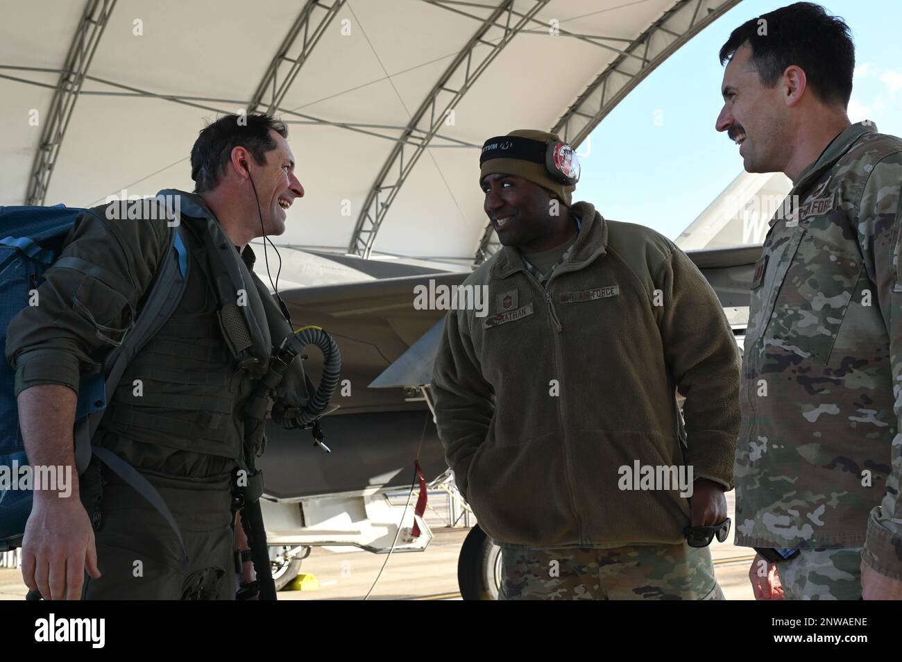 U.S. Air Force Chief Master Sgt. Mykal Donathan, middle, superintendent ...