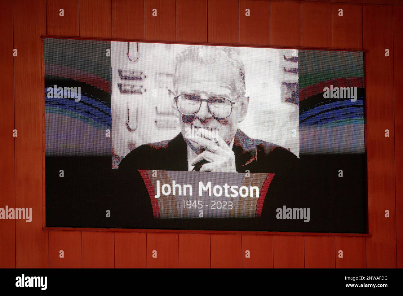 A tribute to John Motson is displayed on the big screen before the ...