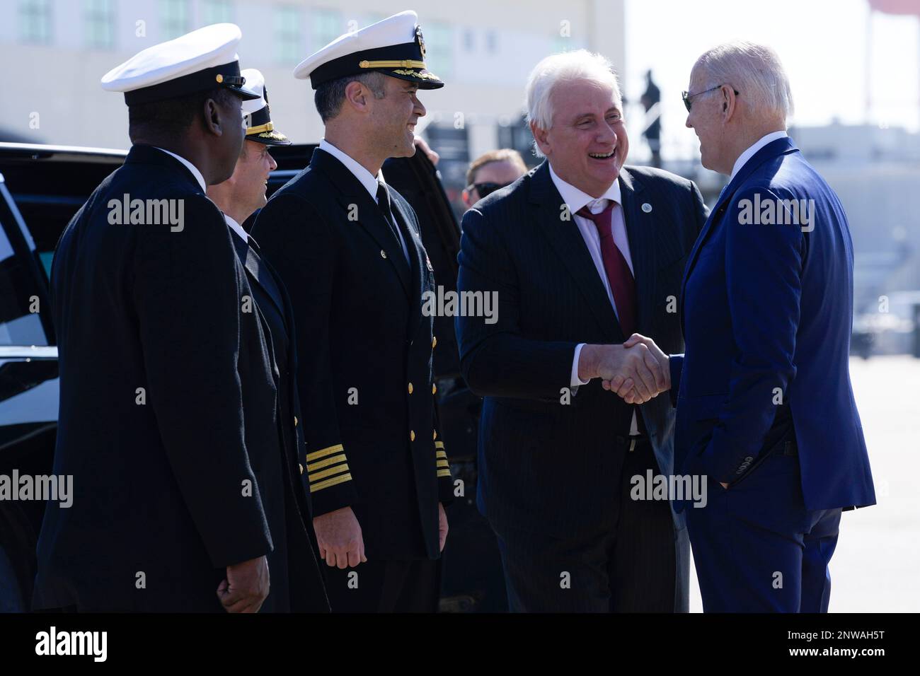 President Joe Biden greets Bobby Dyer, Mayor of Virginia Beach, at ...