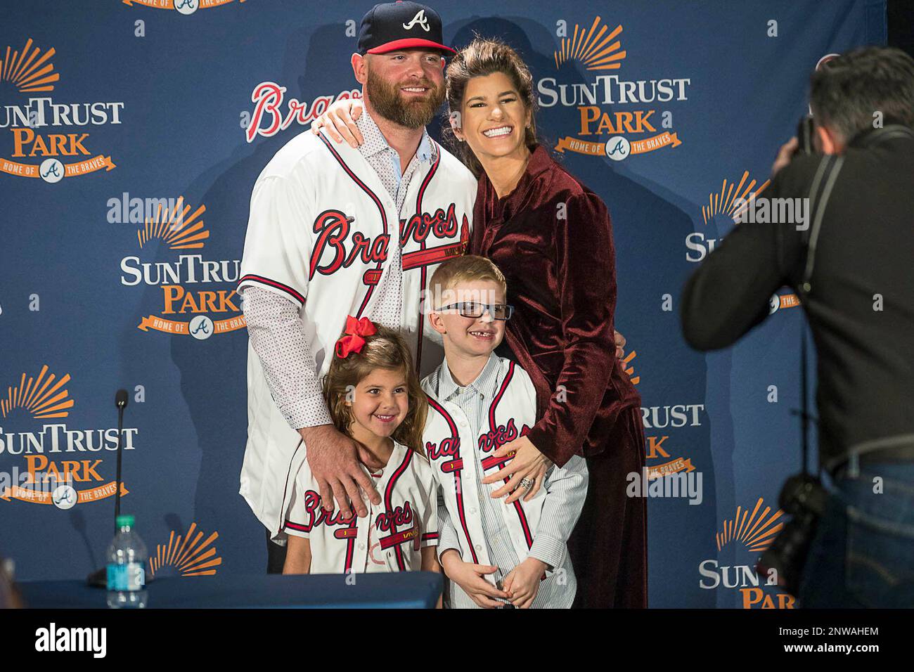 Brian McCann and his wife Ashley McCann pose for a photo with their two ...