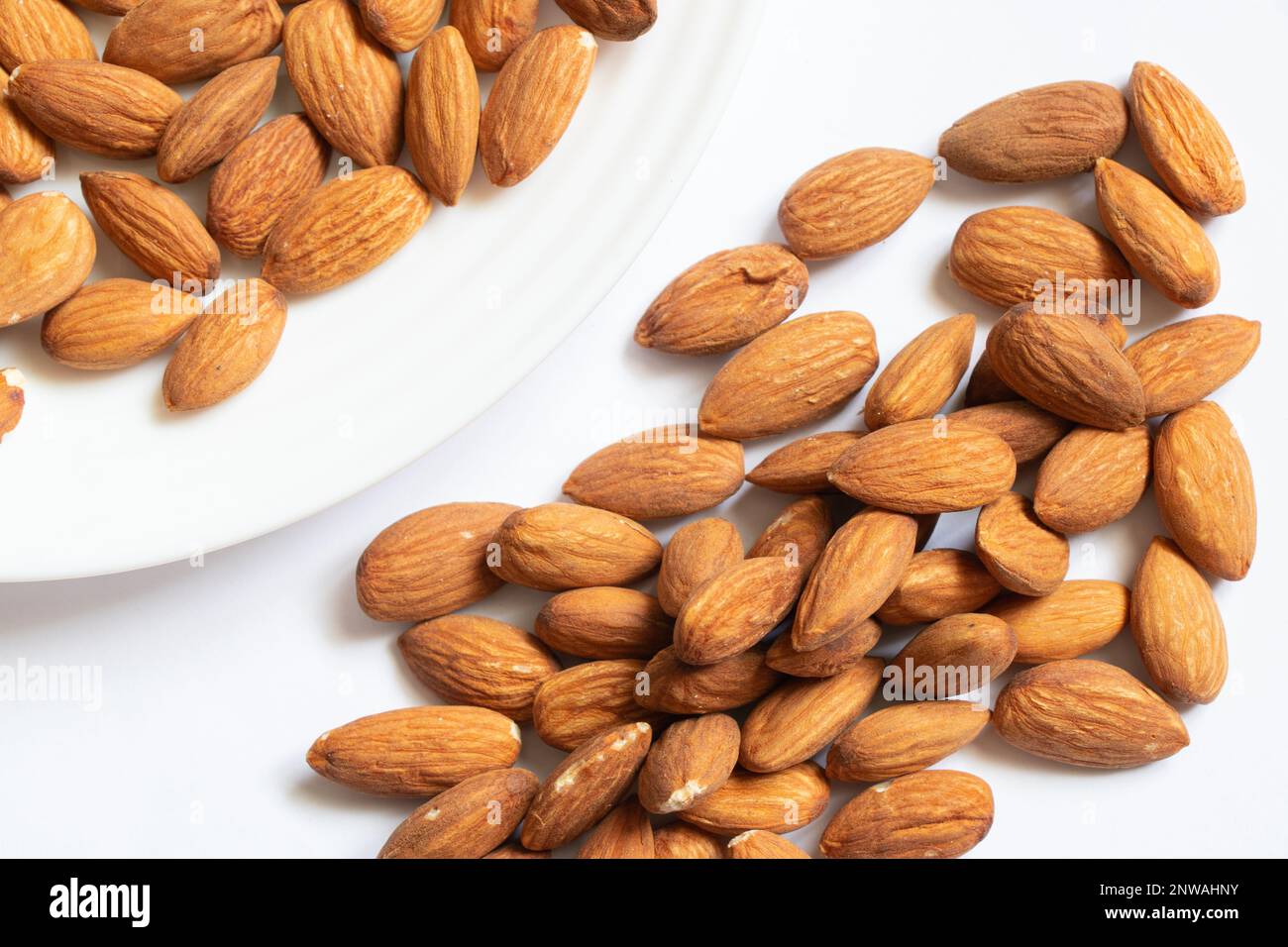 almond on isolated background, raw whole nut Stock Photo - Alamy