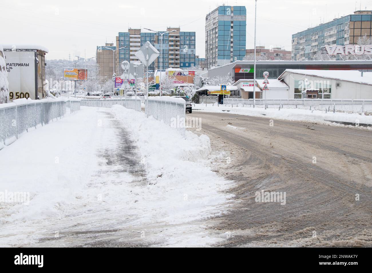 Ukraine Dnipro 26.12.2021 - City in winter with cars in the snow and ...