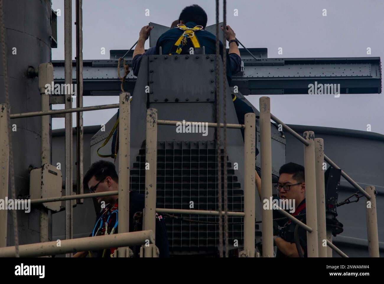 230102-N-XK047-1100 SOUTH CHINA SEA (Jan. 2, 2023) – Sailors replace an ...