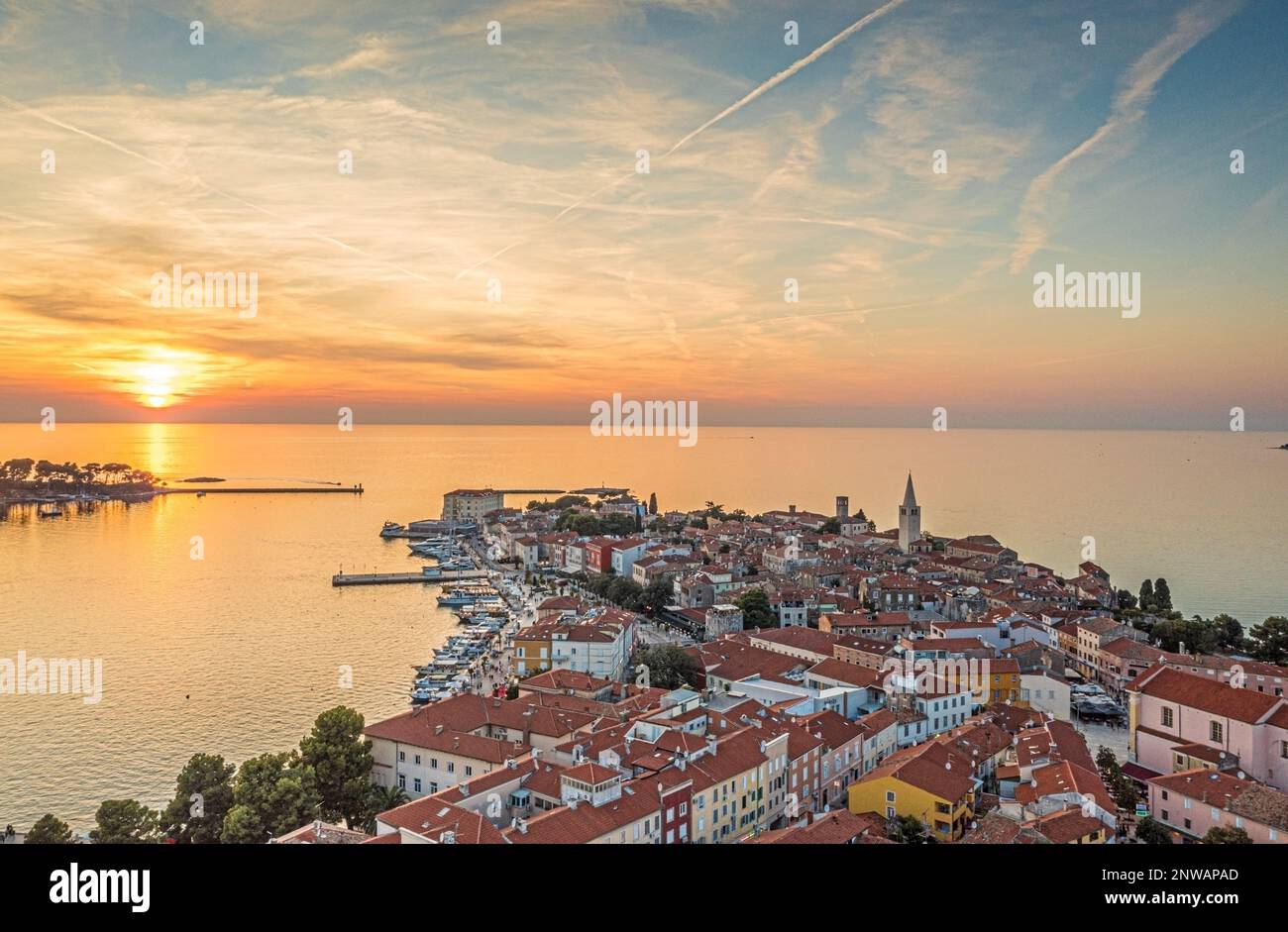 Drone panorama of Croatian coastal town Porec with harbor and promenade ...