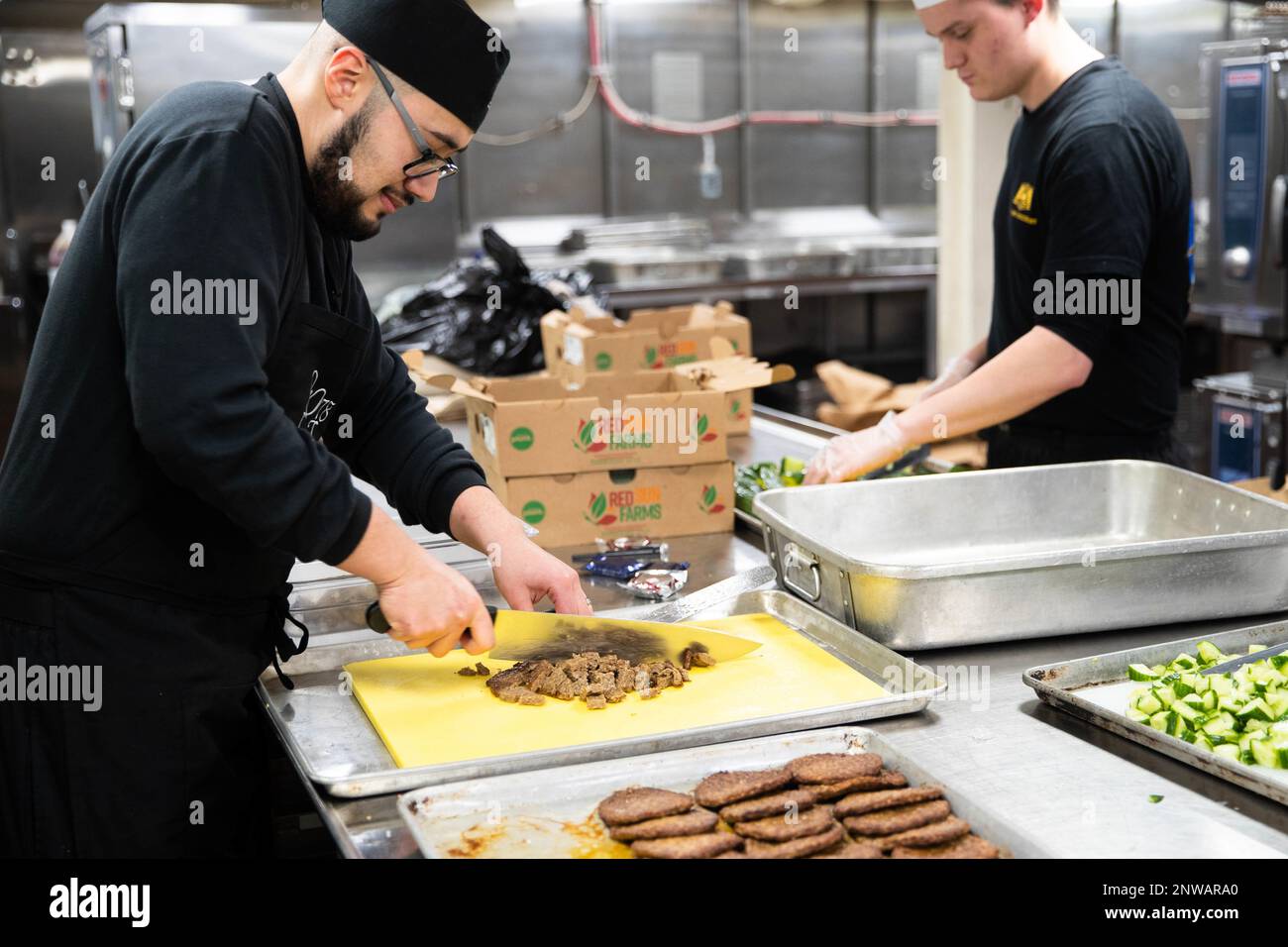 Culinary Specialist 2nd Class Kevin Rivera (left), from Bayonne, New ...