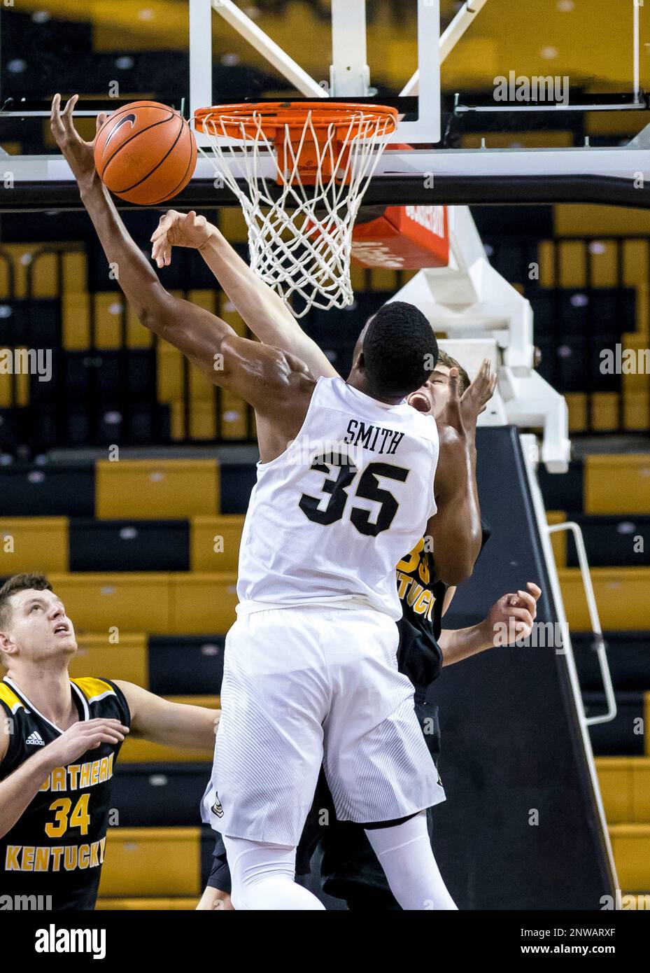ORLANDO, FL - NOVEMBER 24: UCF Knights forward Collin Smith (35) try to make a layup during the ...