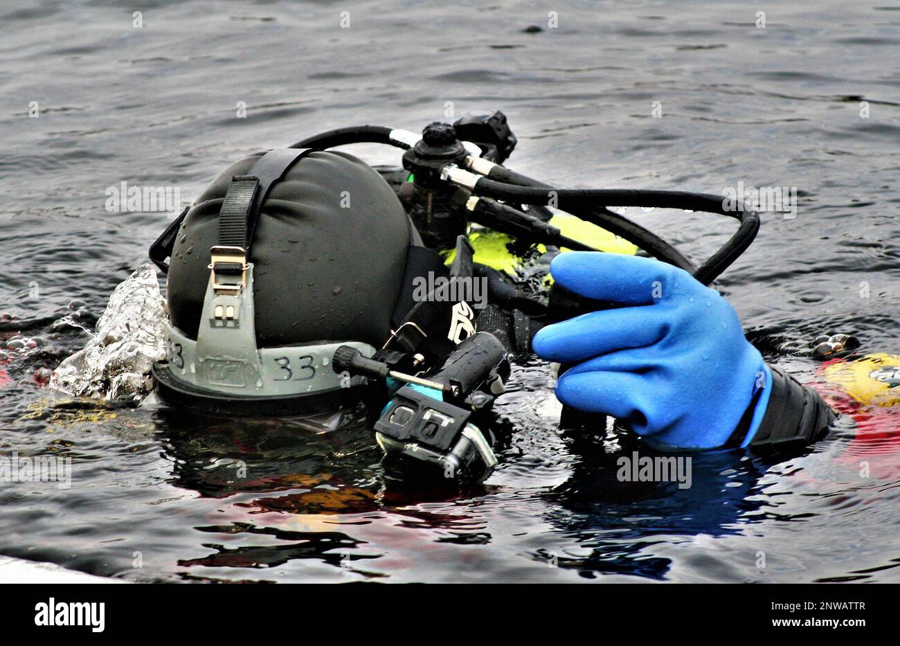 A firefighter with the Directorate of Emergency Services Fire ...