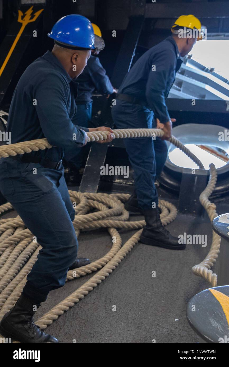 230122-N-VJ326-1042 PACIFIC OCEAN (Jan. 22, 2023) – Sailors heave in a ...