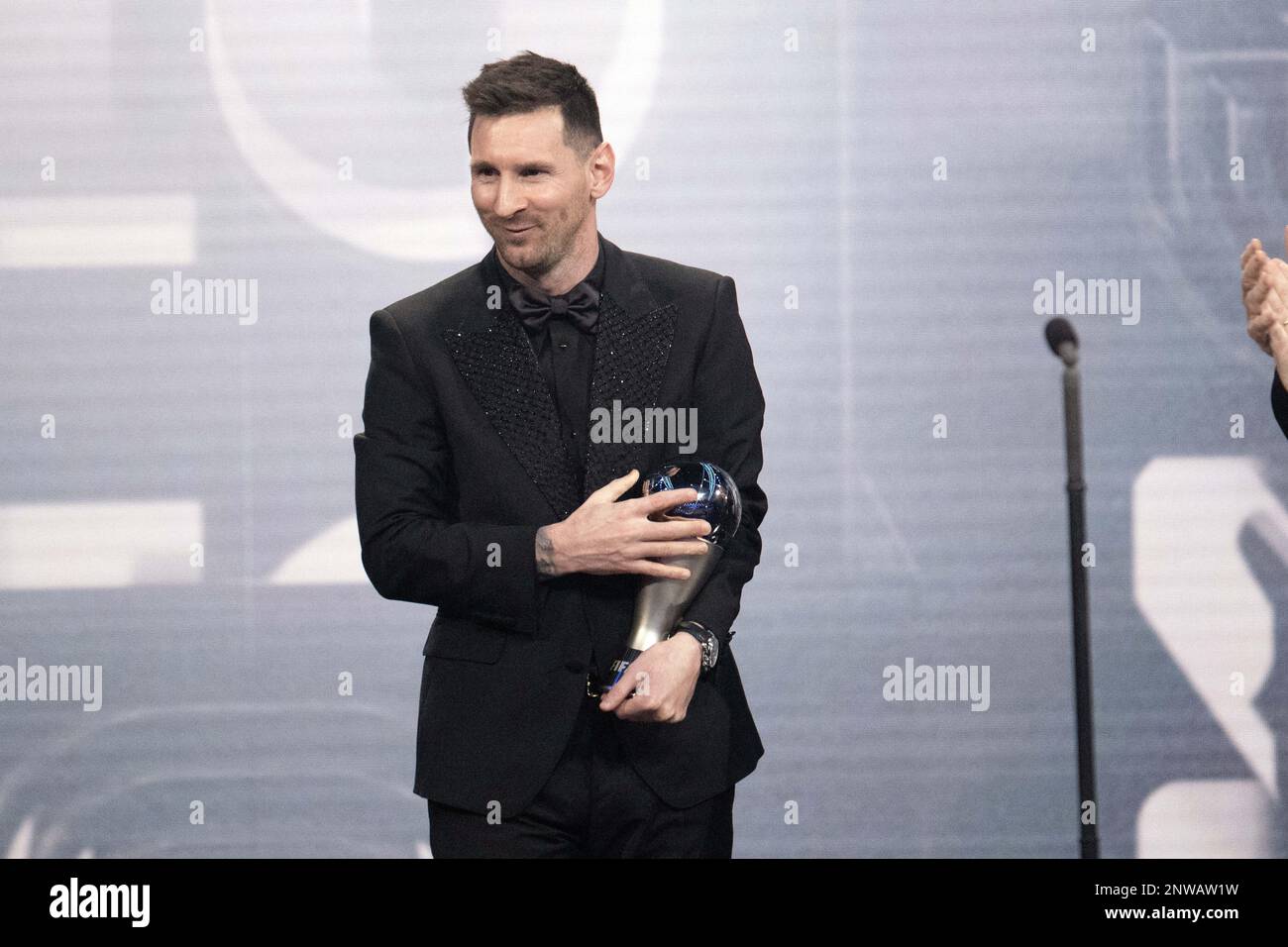 Lionel Messi of PSG receives the FIFA Best Men's player's Trophy during ...