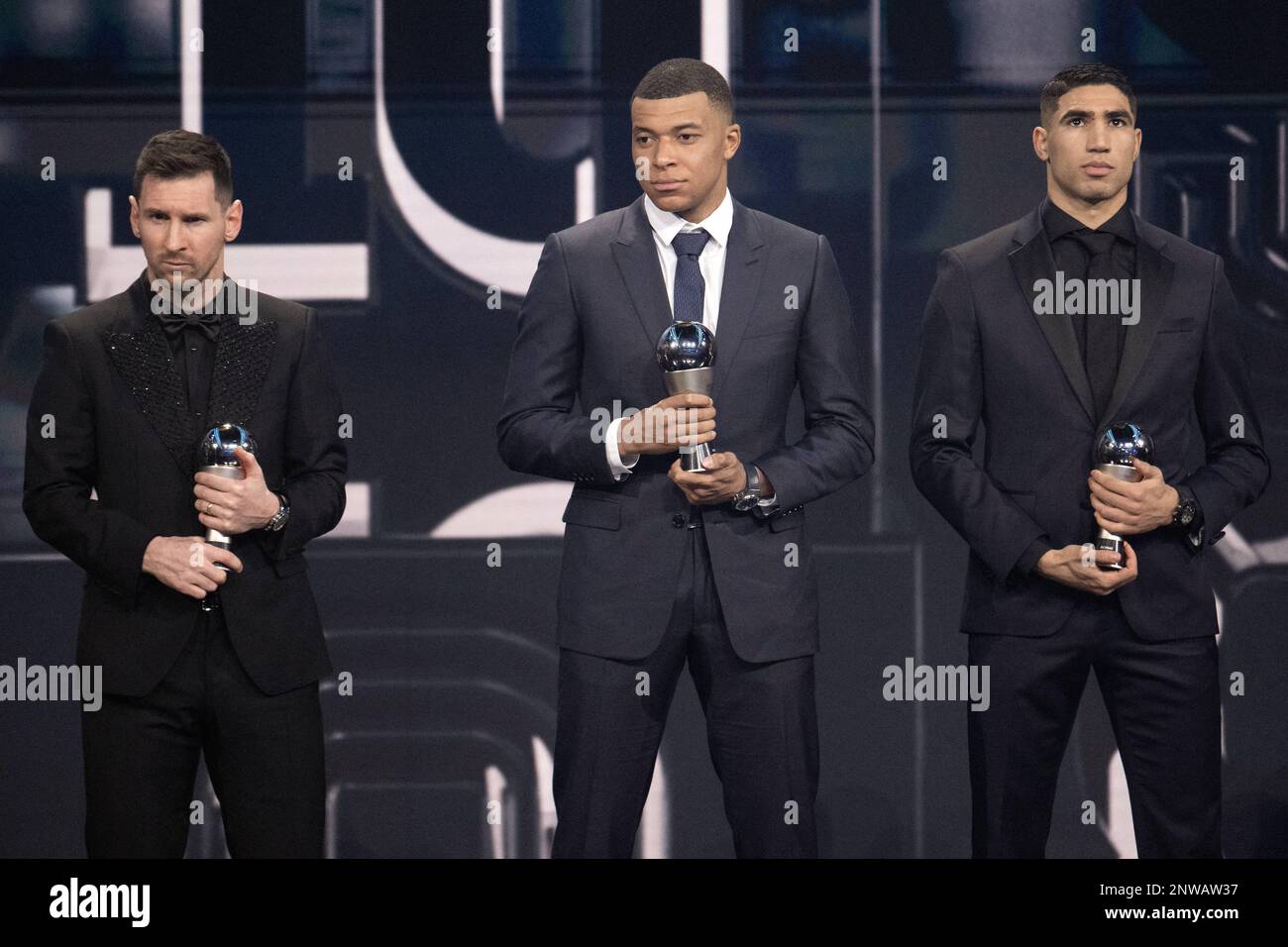 Lionel Messi, Kylian Mbappe and Achraf Hakimi are seen with their ...