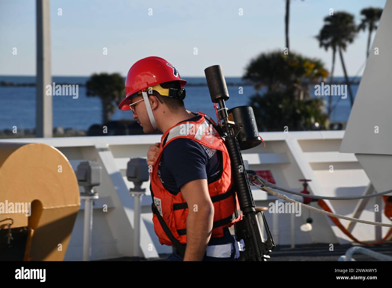 U.S. Coast Guard Petty Officer 3rd Class Carson Contreras, a gunner’s ...
