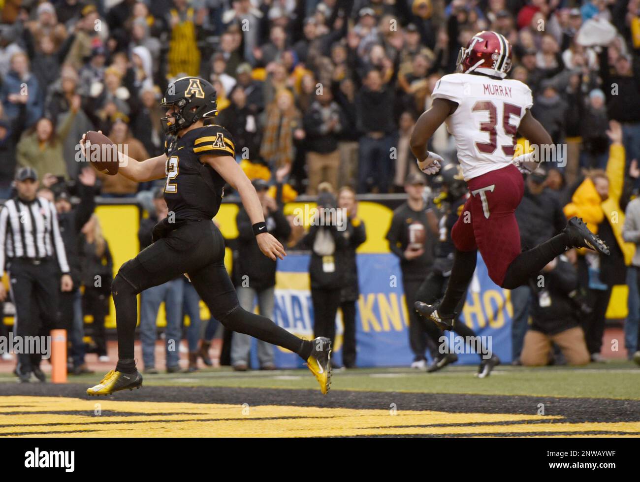 Appalachian State quarterback Zac Thomas gets past Troy's Tyler Murray ...