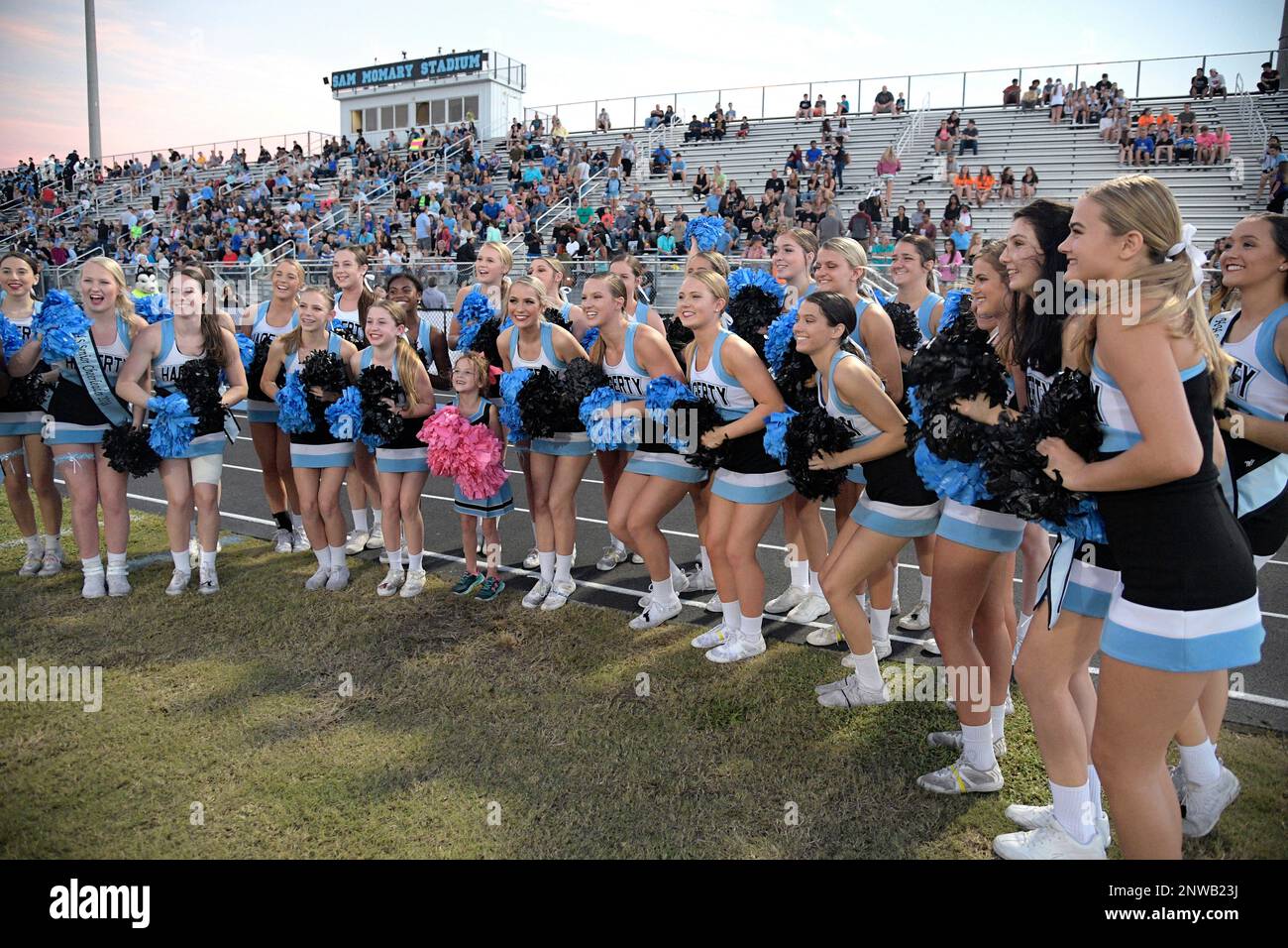 Hagerty cheerleaders perform before a high school football game against ...