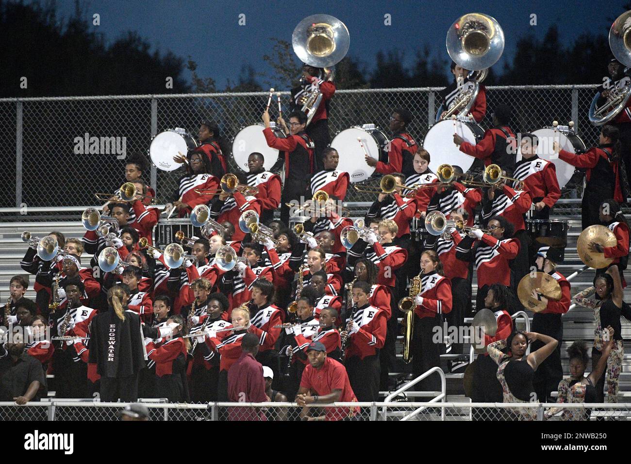 Members of the Edgewater marching band perform in the stands during a ...