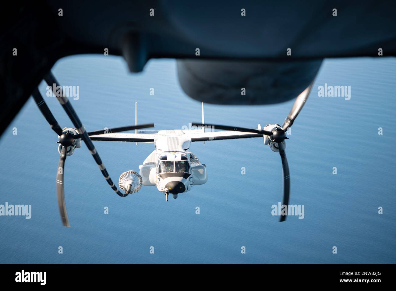 A U.S. Navy CMV-22B Osprey approaches a KC-10 Extender for refueling ...