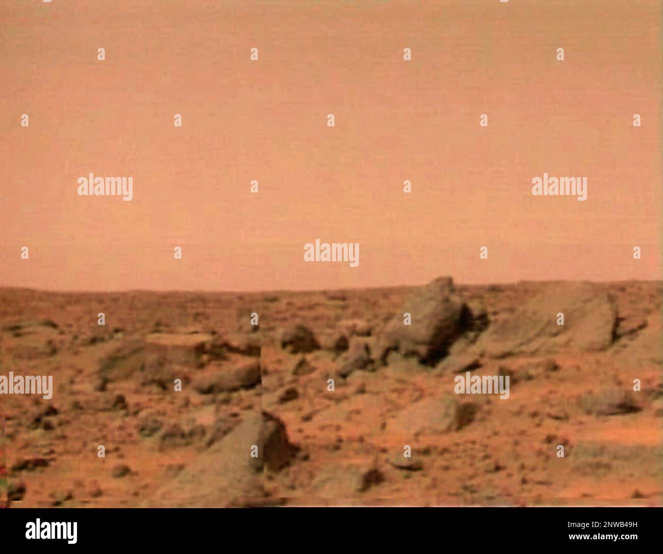 The surface of Mars is shown in this image transmitted to Earth from ...