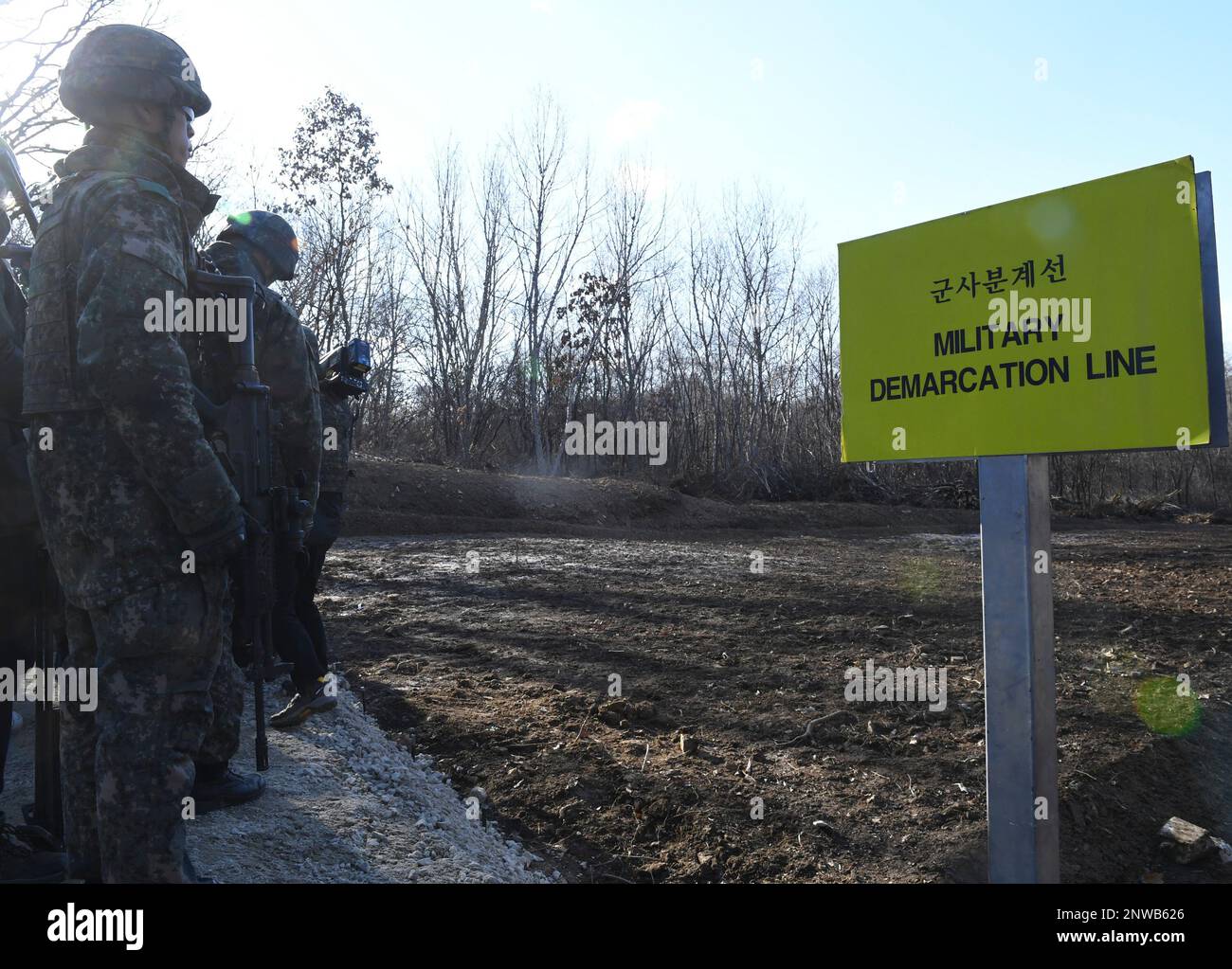 South Korean soldiers stand at Arrowhead Ridge, a site of fierce ...