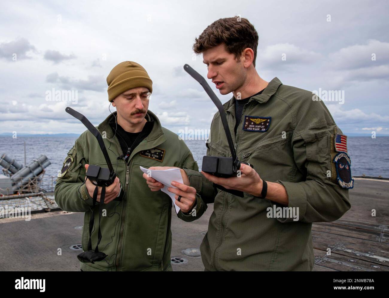 230119-N-TC847-1005 ADRIATIC SEA (Jan. 19, 2023) Lt. Eric Stein, left ...