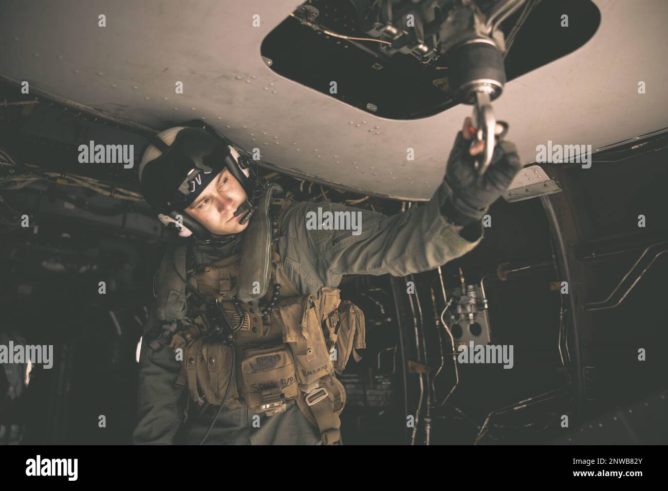 U.S. Marine Corps Cpl. Ryan Maguire, a tiltrotor crew chief with Marine ...