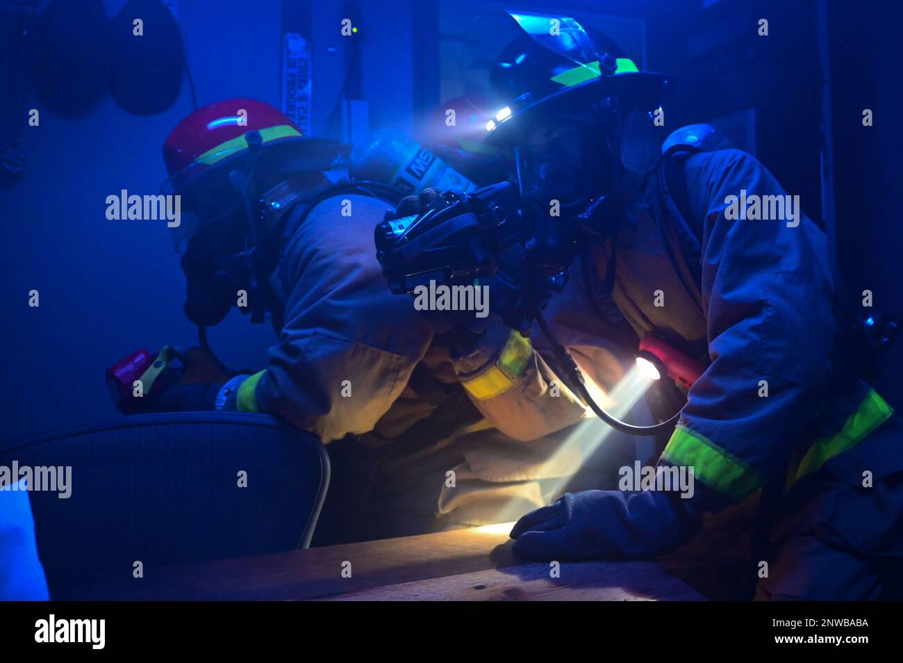 U.S. Coast Guard Petty Officer 3rd Class Jacob Miller, a damage ...
