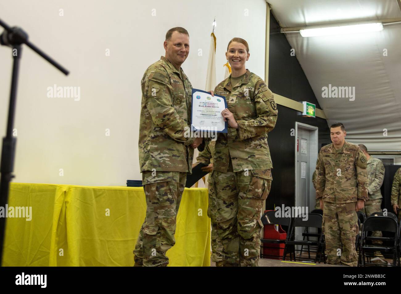 U.S. Army Sgt. Michelle McCarthy poses for picture with Sgt. Maj. Brian Disque, sergeant major ...