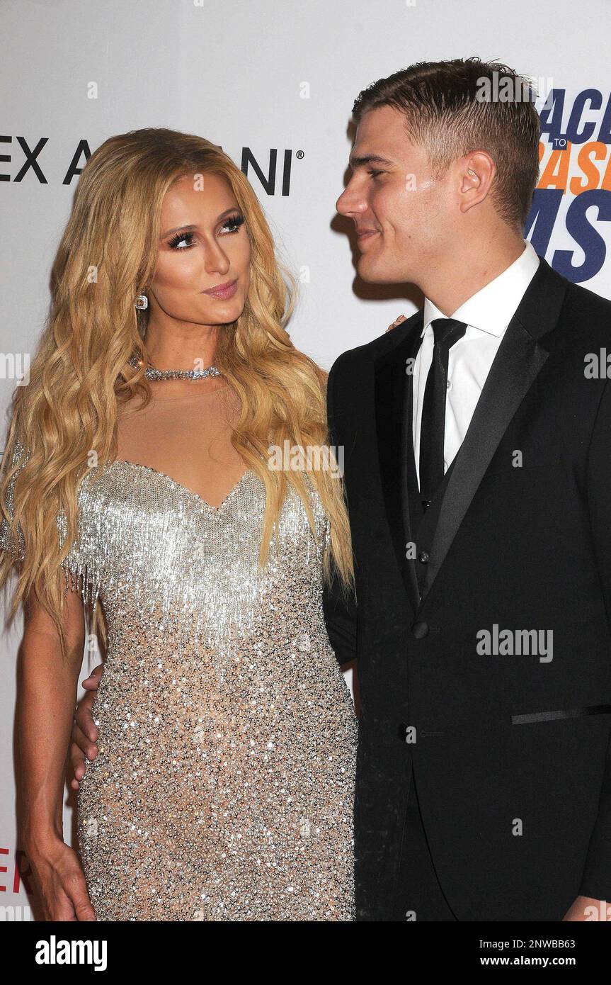 Photo by: galaxy/STAR MAX/IPx 2018 5/5/17 Paris Hilton and Chris Zylka at the 24th Annual Race ...