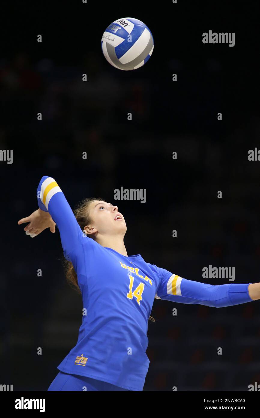 TUCSON, AZ - NOVEMBER 18: UCLA Bruins outside hitter Mac May (14) hits ...