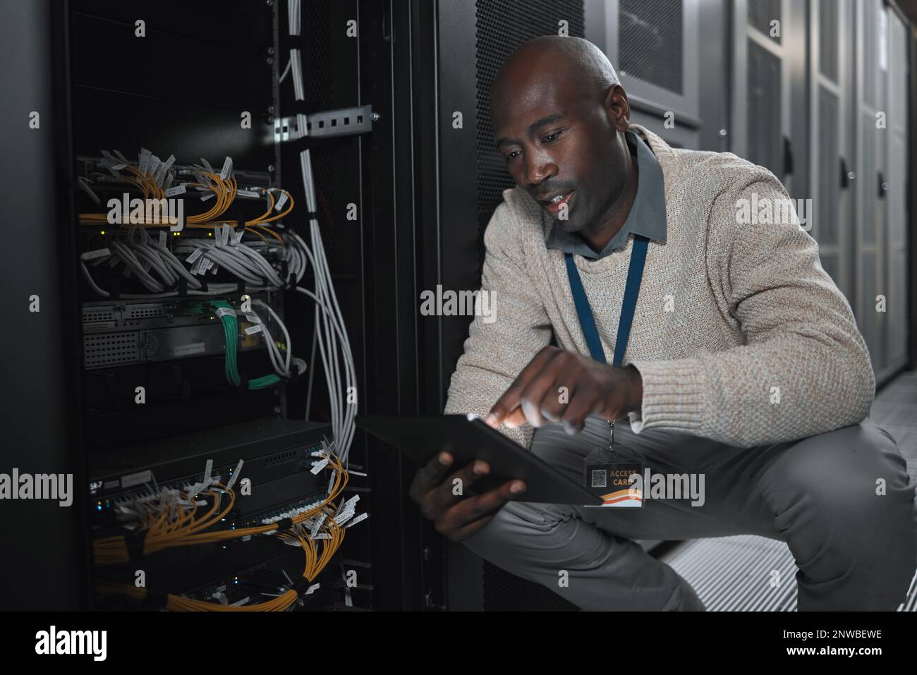Black male server room hi-res stock photography and images - Alamy