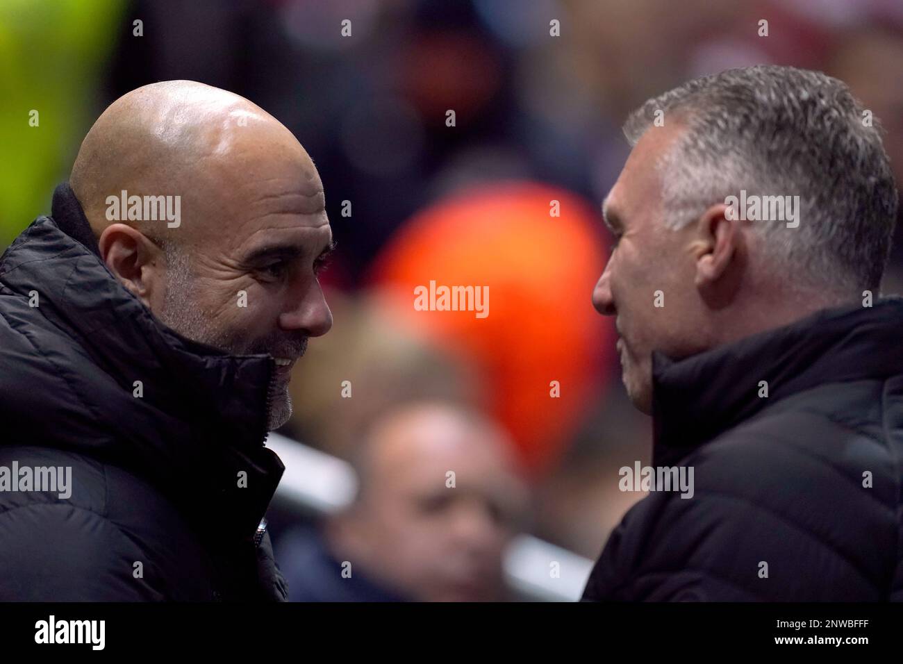 Bristol City manager Nigel Pearson (right) and Manchester City manager ...