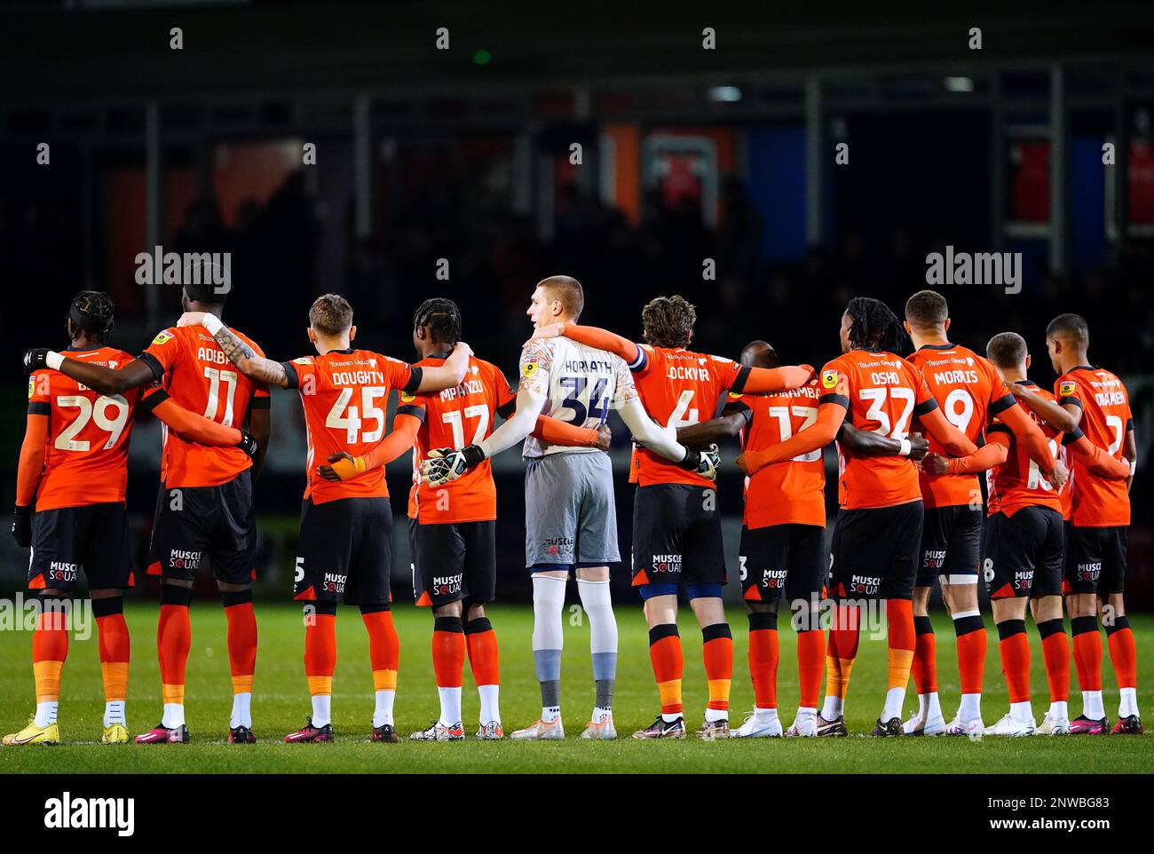 Luton Town players line up on the pitch ahead of the Sky Bet ...