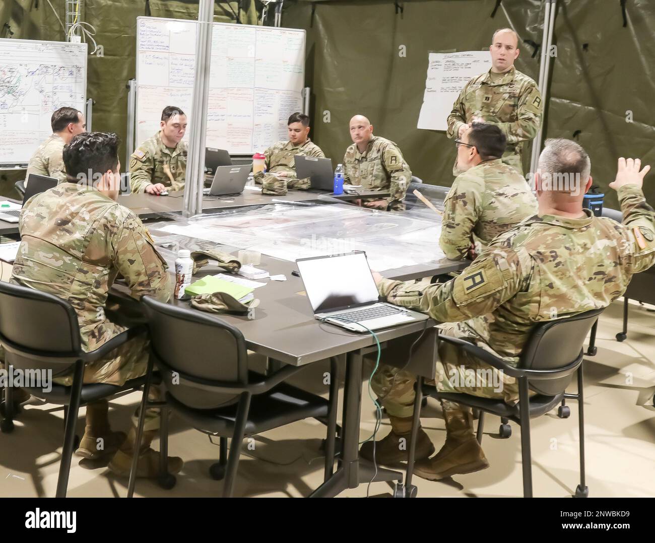 JOINT BASE LEWIS-MCCHORD, Wash. – Capt. Michael Sheahen (top right), an ...