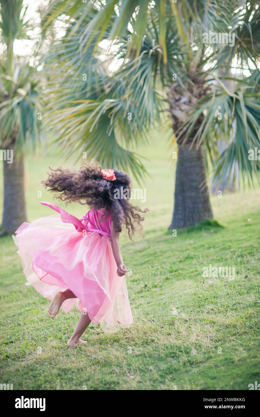 Little back girl in pink tutu dress dancing Stock Photo - Alamy