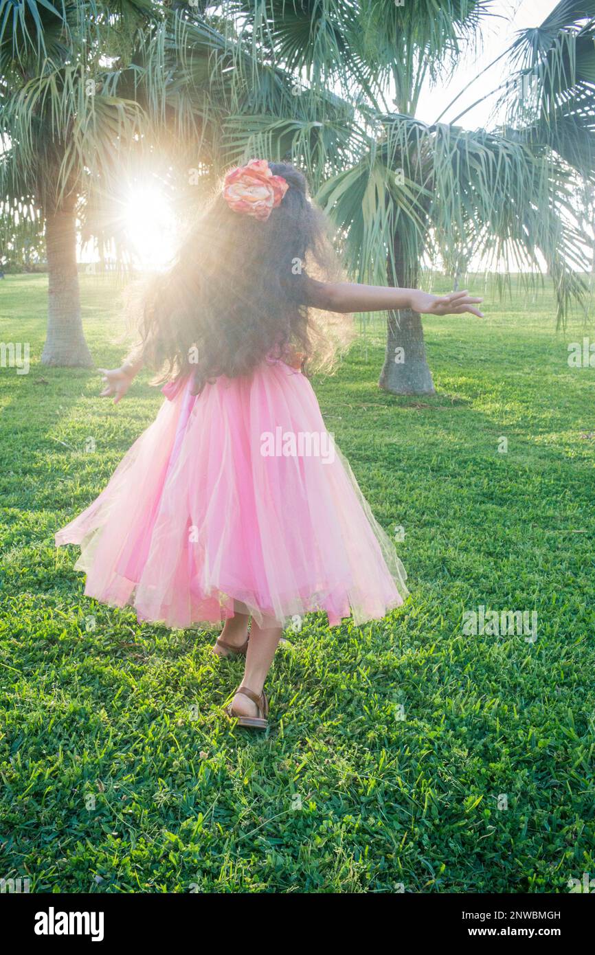 Little back girl in pink tutu dress dancing Stock Photo - Alamy