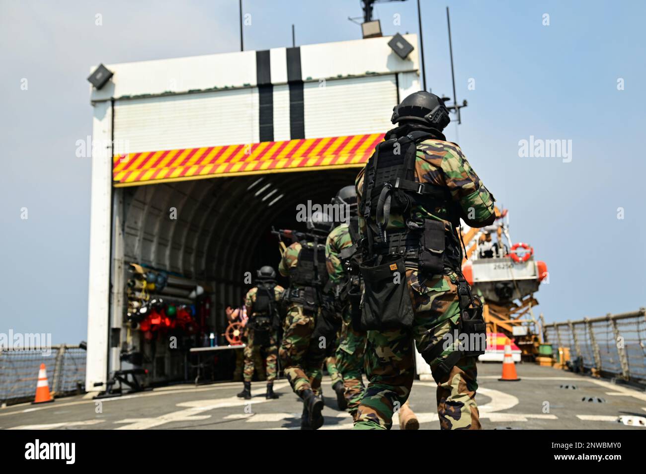 Members of the Togolese Navy conduct law enforcement training aboard ...