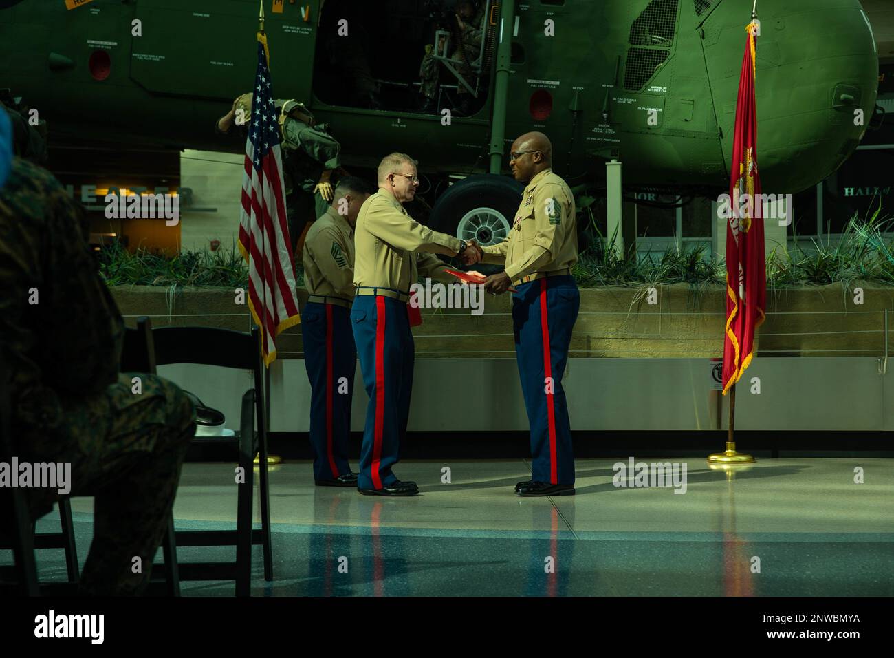 Col. Rory Kent, left, presents MSgt. Ralph Wright with an award during ...