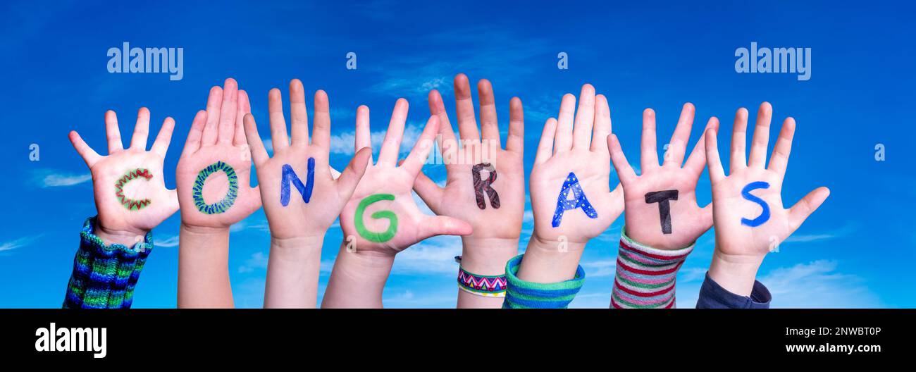 Children Hands Building Word Congrats, Blue Sky Stock Photo - Alamy